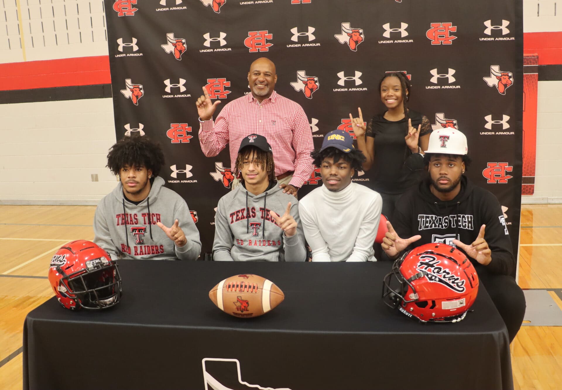 Quartet of Cedar Hill Longhorns Sign Football Scholarships